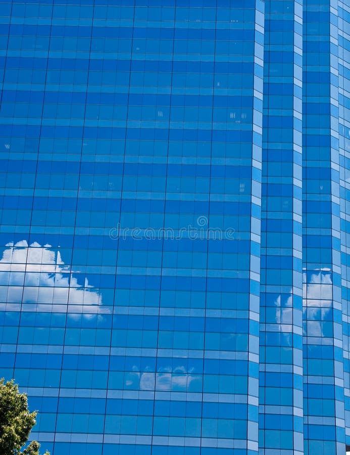 Clouds and Blue Sky Reflected in Wall of Glass Stock Image - Image of ...