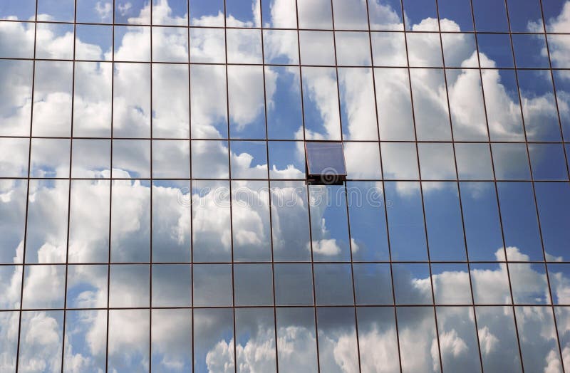 The Clouds and Blue Sky Reflected in Windows of Skyscraper Stock Photo ...