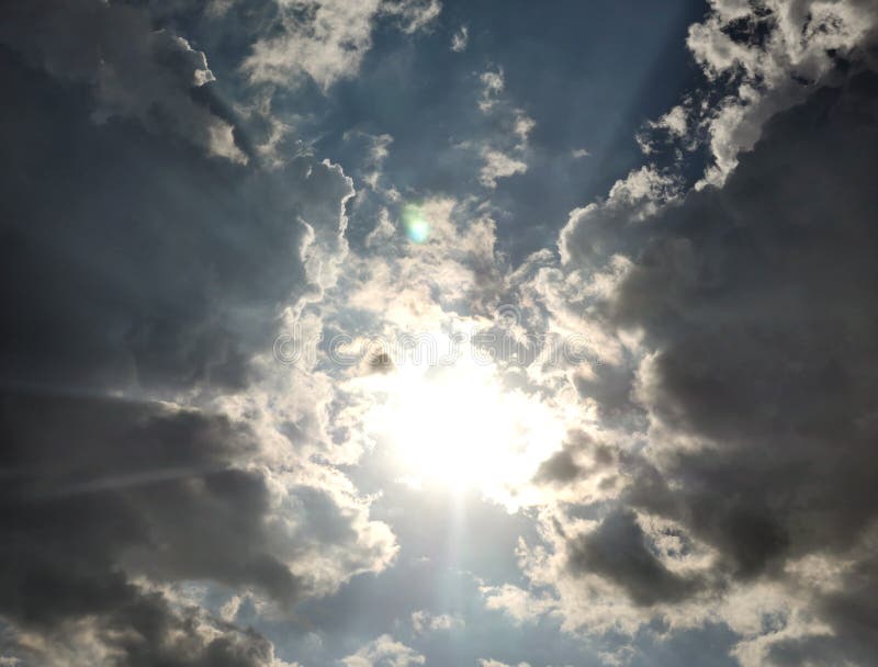Clouds blue sky sun ray stock photo. Image of meteorology - 204508952
