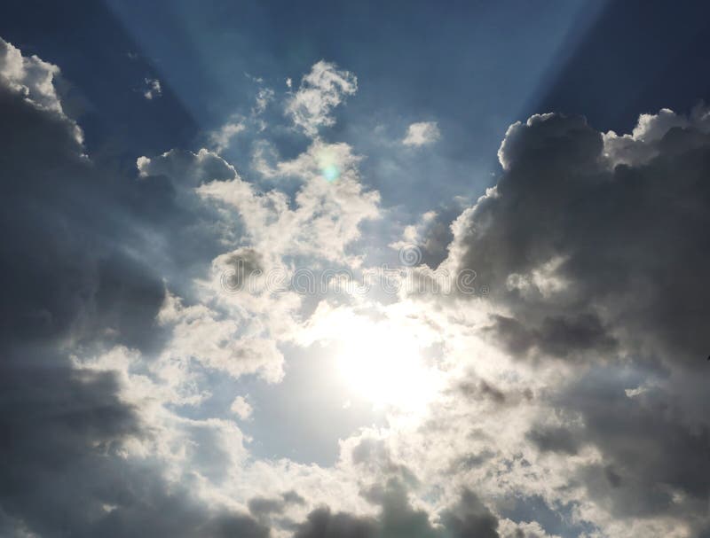 Clouds blue sky sun ray stock image. Image of sunlight - 204508963