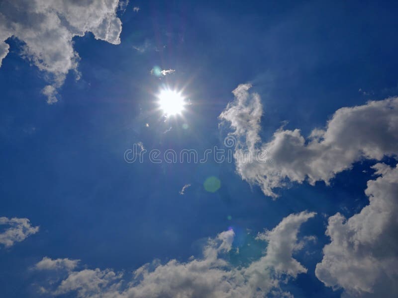 Clouds blue sky sun ray stock photo. Image of fluffy - 187160302