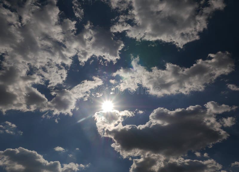 Clouds blue sky sun ray stock photo. Image of background - 204533444