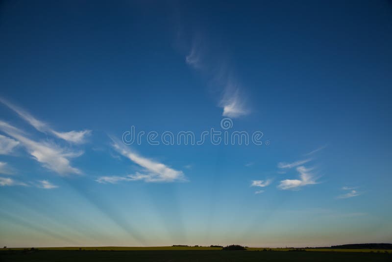Clouds Cast Shadows that Converge in the Sky Beyond the Horizon Stock ...