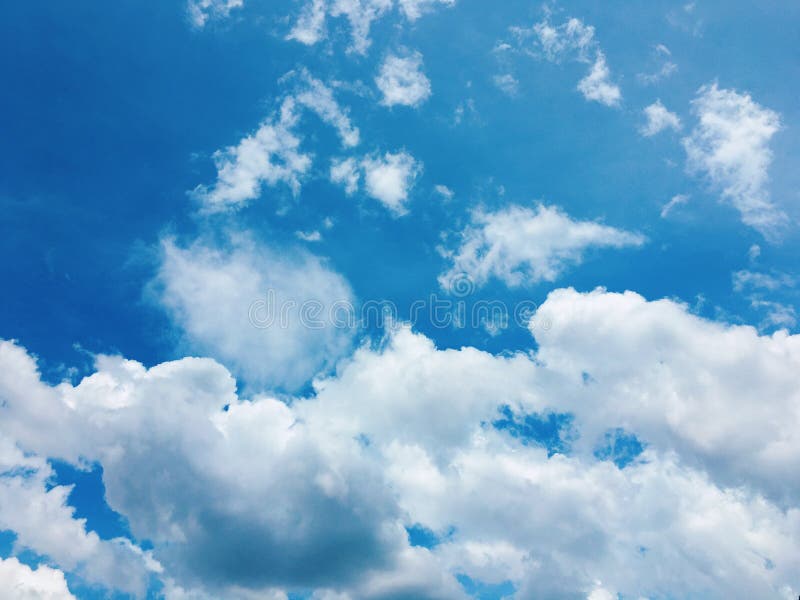 Cheerful Clouds Over the Bluffs Stock Photo - Image of lake, juniper ...