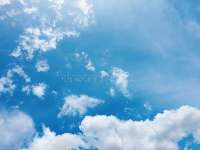 Cheerful Clouds Over the Bluffs Stock Photo - Image of lake, juniper ...