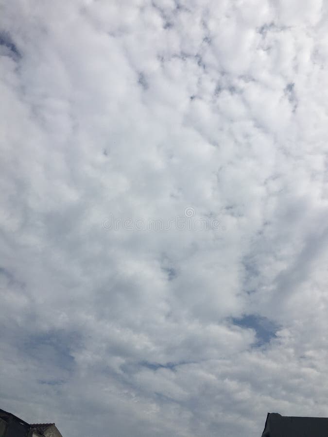 Cheerful Clouds Over the Bluffs Stock Photo - Image of lake, juniper ...