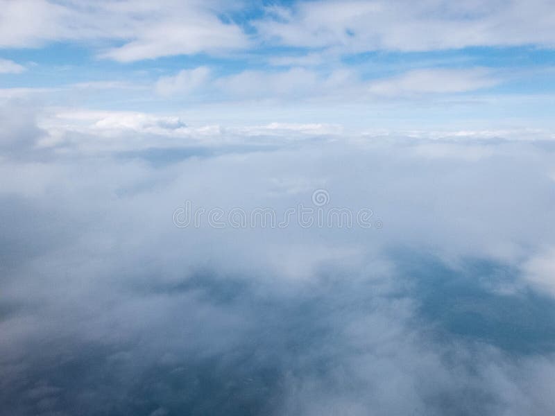 Clouds and Clear Bright Blue Sky. Aerial View from Plane Illuminator ...