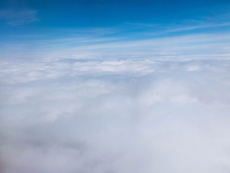Clouds and Clear Bright Blue Sky. Aerial View from Plane Illuminator ...
