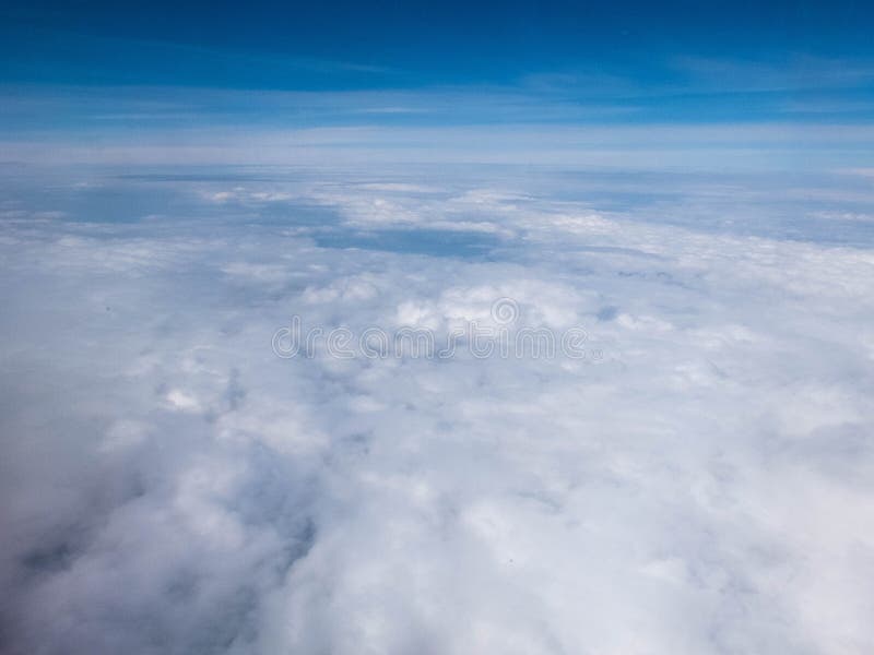 Clouds and Clear Bright Blue Sky. Aerial View from Plane Illuminator ...
