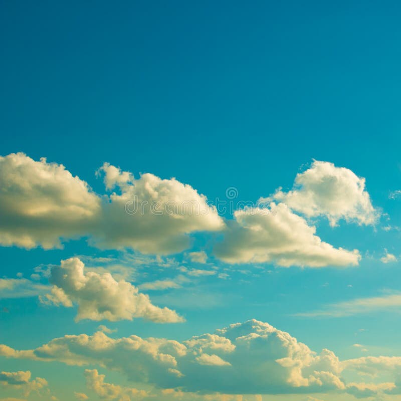 Clouds on a clear day stock image. Image of nooning, noontime - 97769615