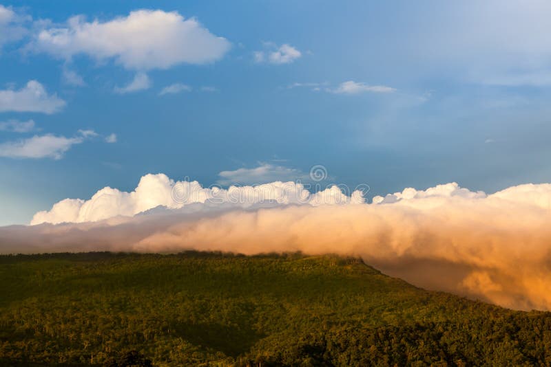 Clouds cover the mountain stock photo. Image of valley - 33094768