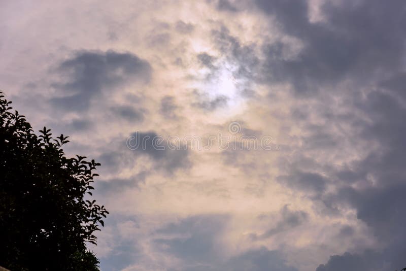Clouds cover the sun stock image. Image of nature, meteorology - 75333863