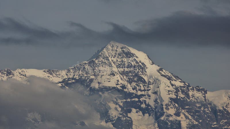 Clouds Creeping Over Mt Monch Stock Image - Image of niederhorn, alpine ...