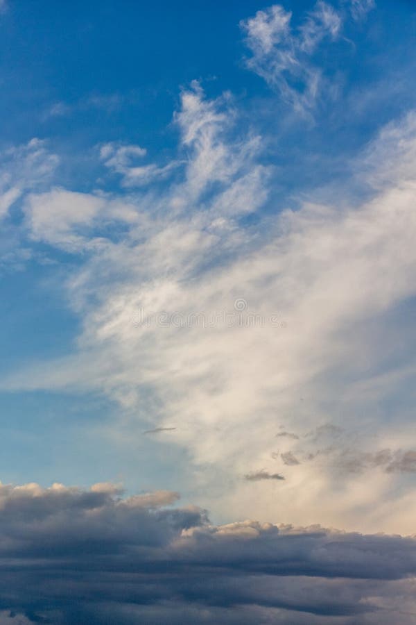 Clouds of Different Shapes and Colors on a Background of Blue Sky ...