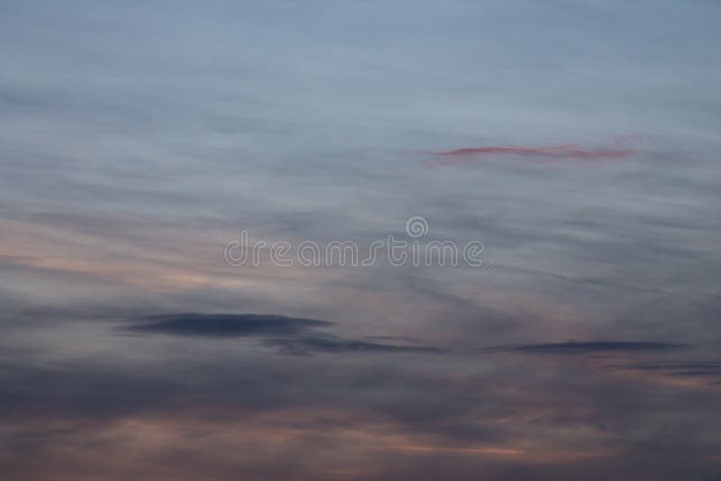 Clouds at dusk stock image. Image of dark, dawn, beautiful - 95531745