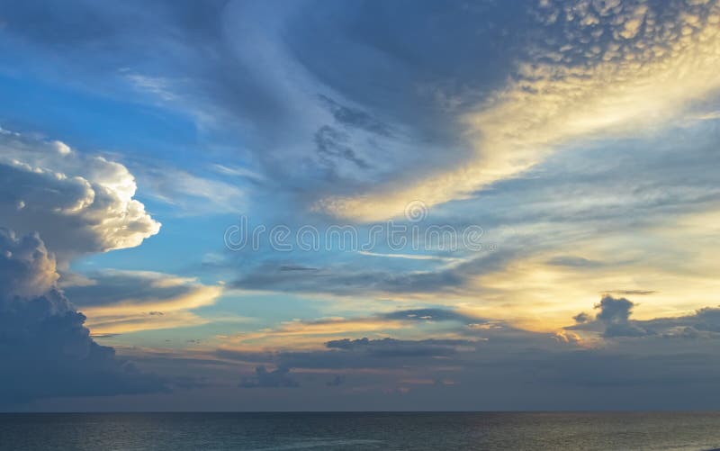 Clouds at dusk over ocean stock photo. Image of horizon - 126651740