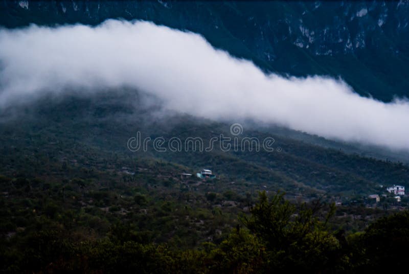 Clouds Falling Down the Mountain Stock Photo - Image of wood, mountain ...