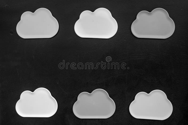 Clouds Figures for Cloud Storage on Black Background Top View Mockup ...