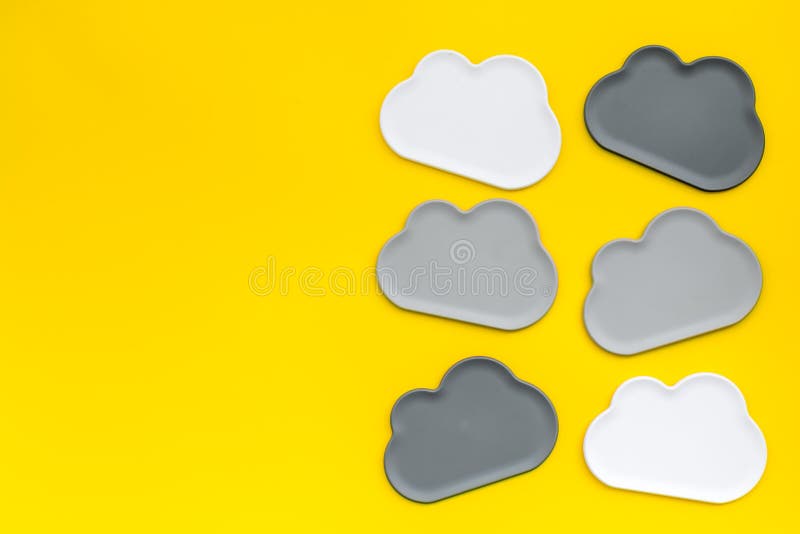 Clouds Figures for Cloud Storage on Yellow Background Top View Mockup ...