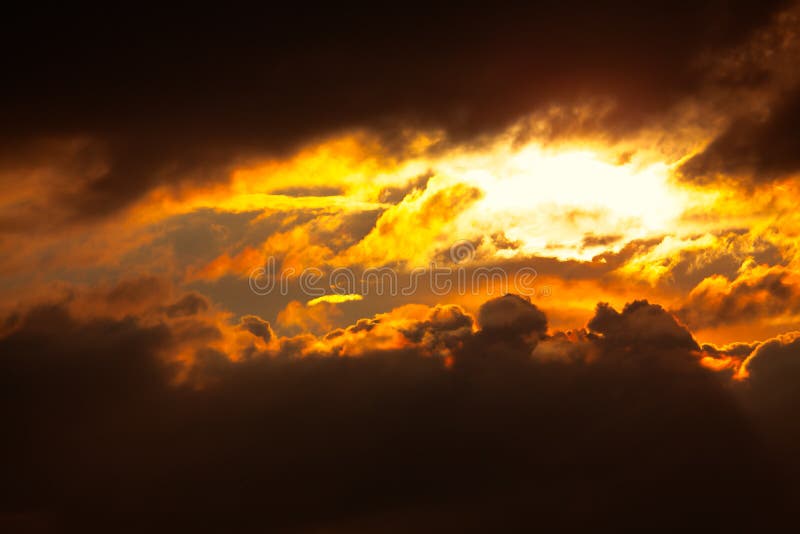 Clouds in flaming colors stock photo. Image of nightfall - 200938316