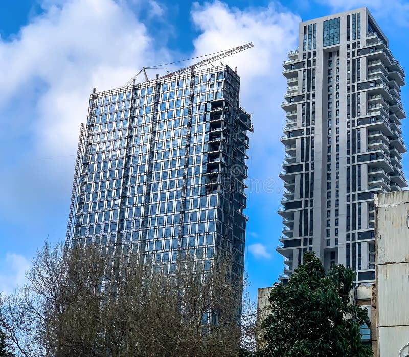 Clouds Float Over High-rise Buildings Stock Photo - Image of high, city ...