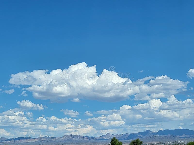 Clouds Floating Above the Landscape Below! Stock Image - Image of ...