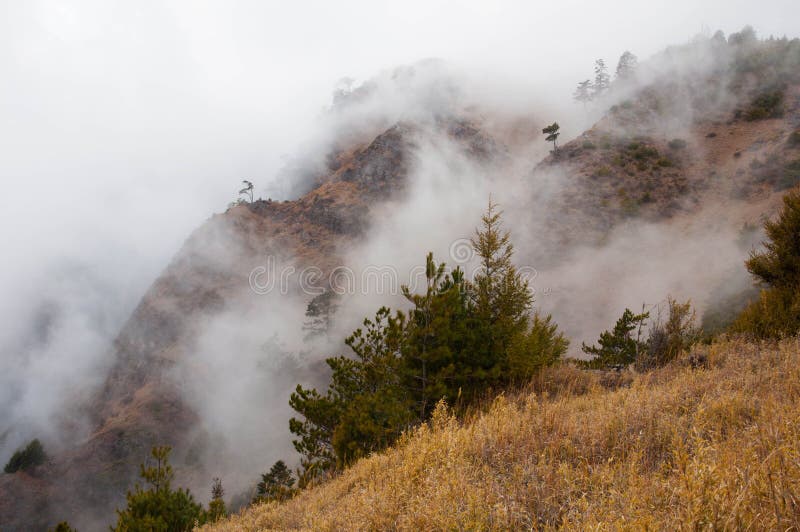 Clouds Floating through the Ridges Stock Image - Image of valley, ridge ...
