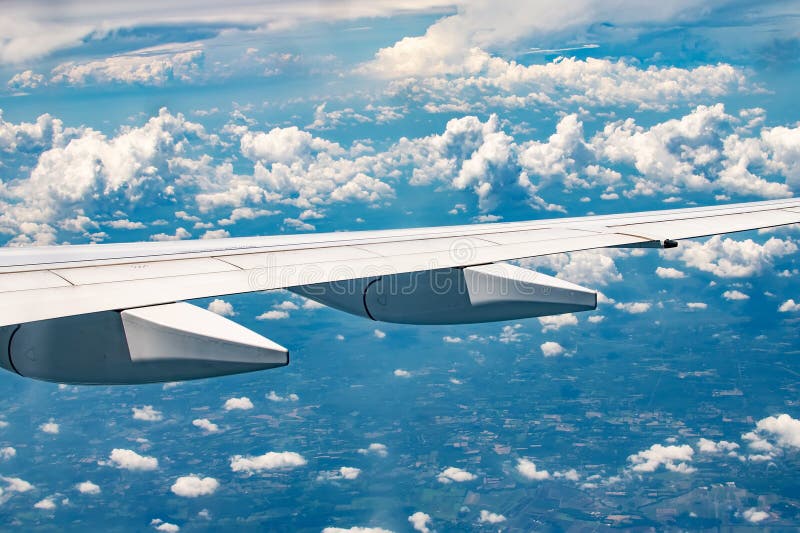 Clouds Fly Under the Wing of an Airplane. View from Above on the Earth ...