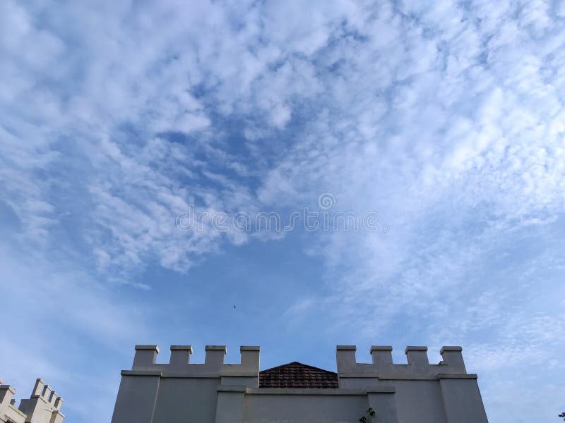 Clouds Form Over Buildings in the Morning Stock Photo - Image of ...