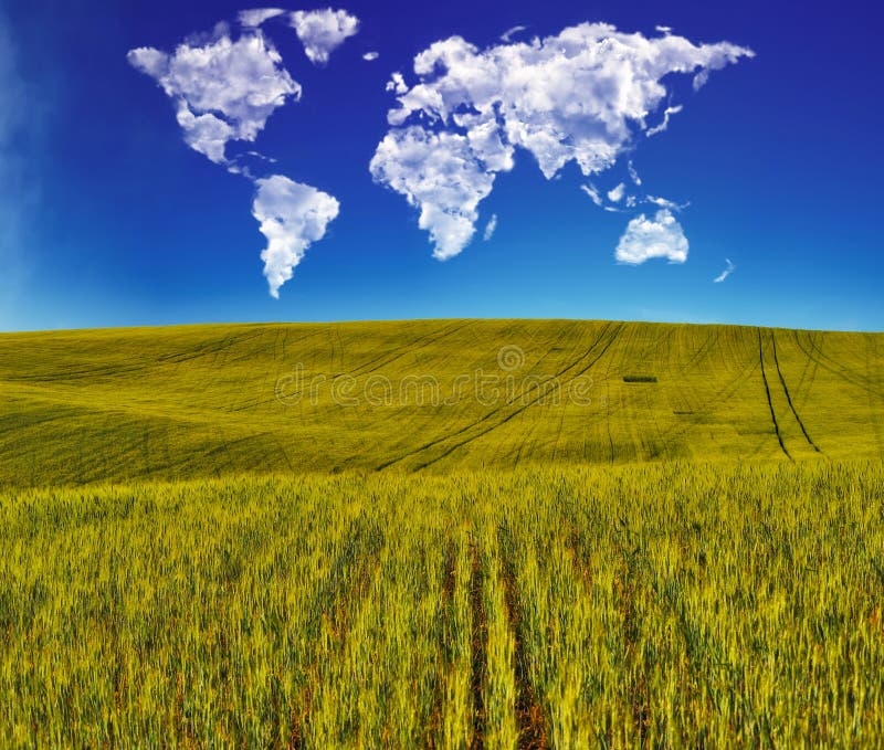Clouds in the Form of a World Map Over a Green Field. Picturesque ...