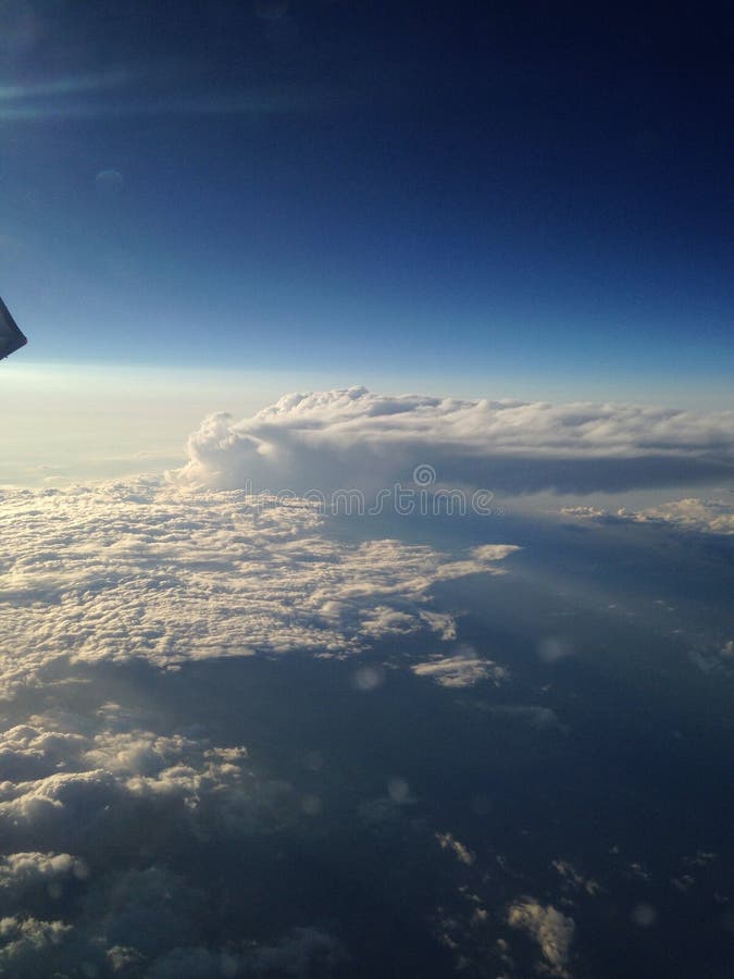 Clouds stock image. Image of cool, funky, clouds, plane - 50561119