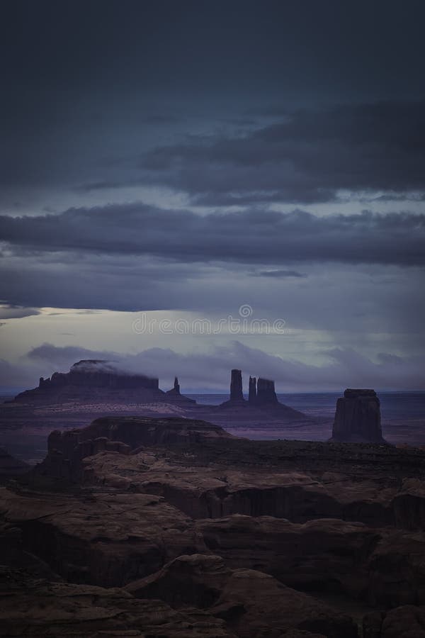 Clouds Gathering Over the Canyon Full of Rock Formations Stock Photo ...