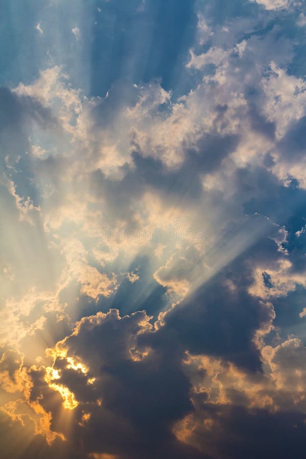 Clouds and golden sunbeam stock photo. Image of orange - 98624484