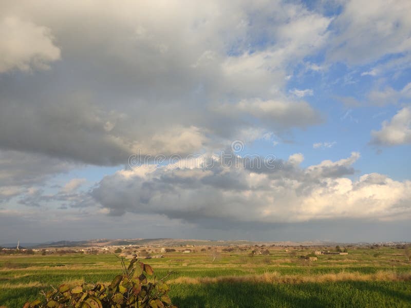 Clouds and greenery stock photo. Image of horizon, hill - 243715558