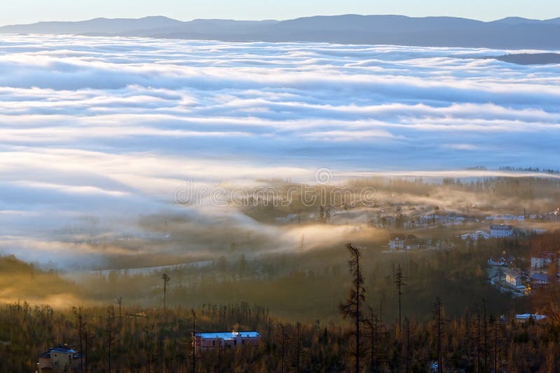 Clouds Illuminated by Morning Sun Over Valley. Stock Image - Image of ...