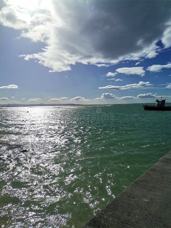The Clouds Just Hanging There Above the Blue Waters Stock Photo - Image ...