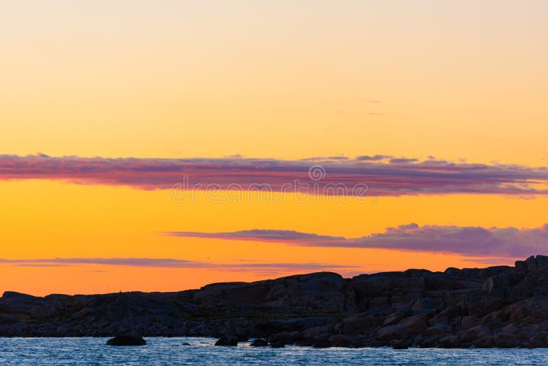 Clouds Lit Up Purple by the Setting Sun Stock Image - Image of beach ...