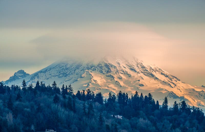 Clouds on Mount Rainier 8 stock image. Image of mountain - 269335107
