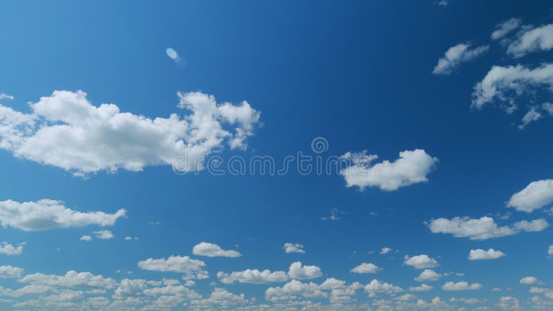 Clouds Move in the Blue Sky. Running Clouds Against the Blue Sky. Time ...