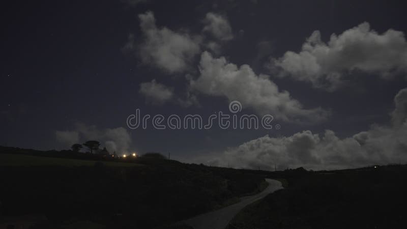Clouds Passing Over Countryside Road at Night Stock Footage - Video of ...