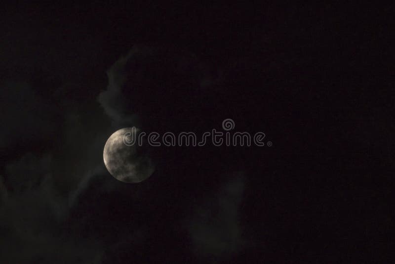 Clouds obscure full moon stock photo. Image of sphere - 347837498