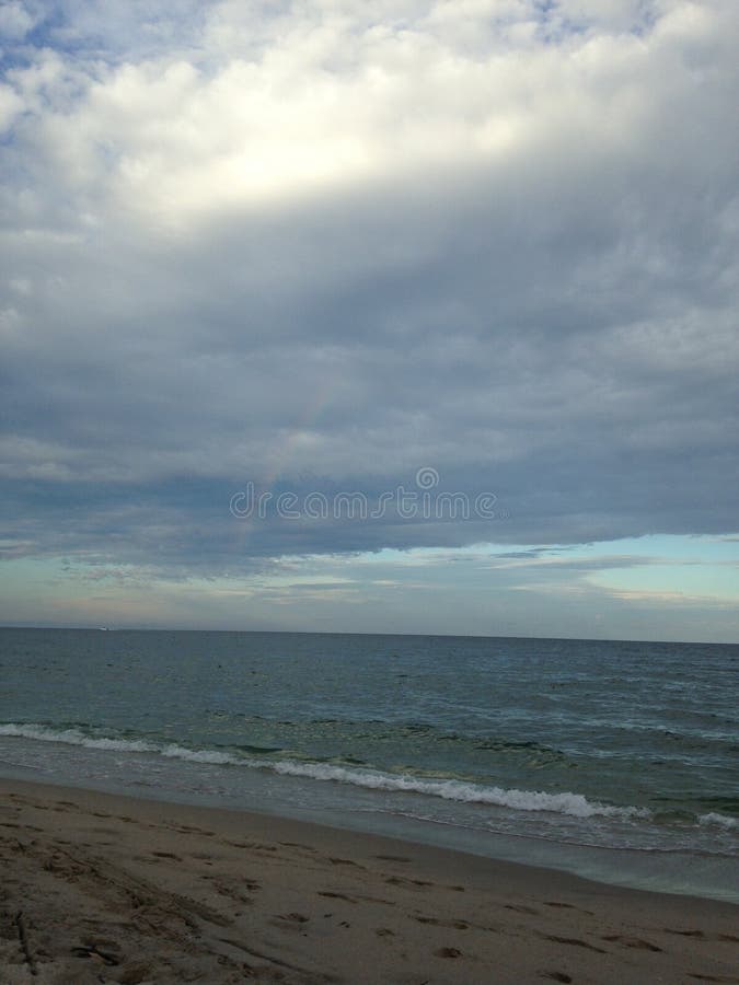 Clouds over beach stock photo. Image of peace, horizon - 40084278