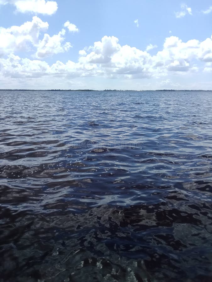 Calm Deep Blue Sea with Ripples on the Surface of the Water. Dark Blue ...