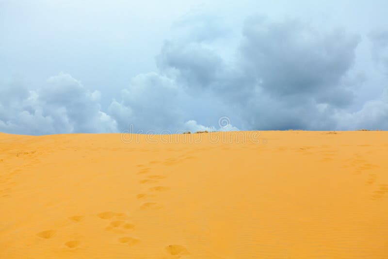 Clouds over desert stock photo. Image of dramatic, golden - 245593660