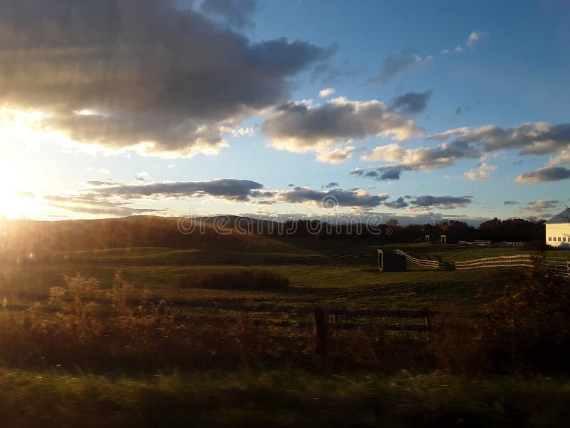 Clouds over the farm stock photo. Image of clouds, peering - 138233796
