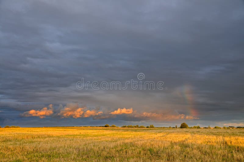 Clouds over the field. stock image. Image of outdoors - 123911655