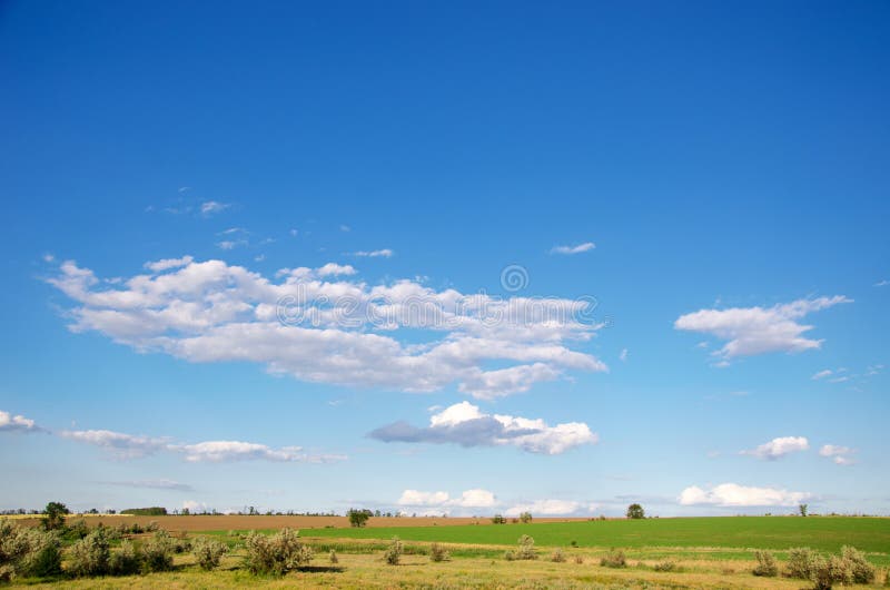 Clouds over fields stock photo. Image of multicolored - 101416936