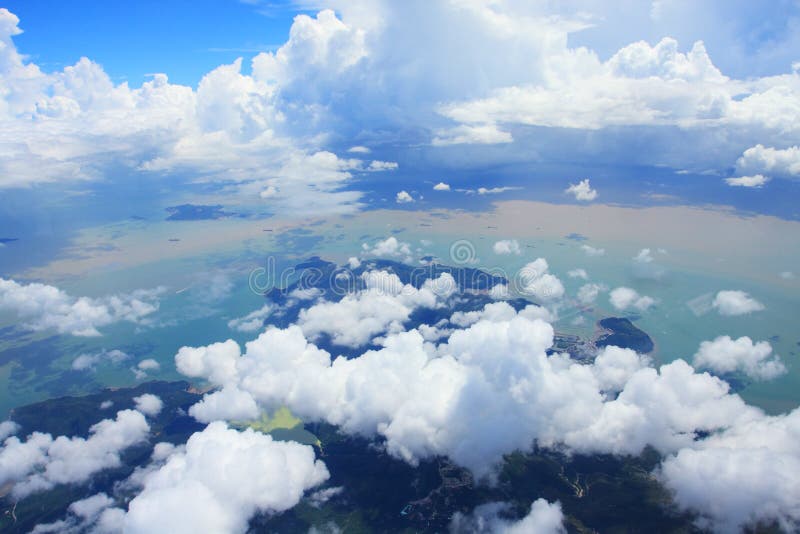 Clouds over the island stock photo. Image of background - 5625402