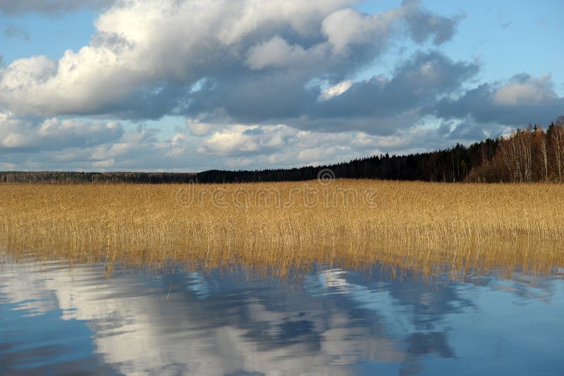 Clouds over lake stock photo. Image of land, point, landscape - 27329192