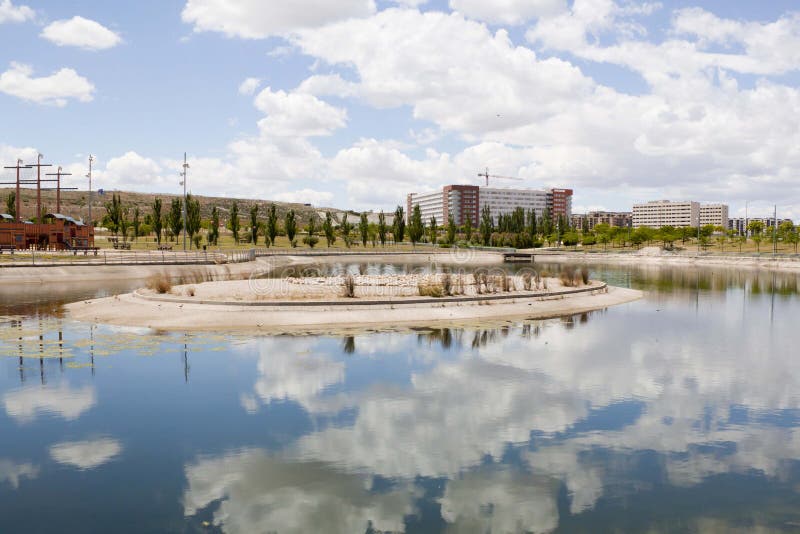 Clouds Over a Lake, a Park and an Urbanization Stock Photo - Image of ...